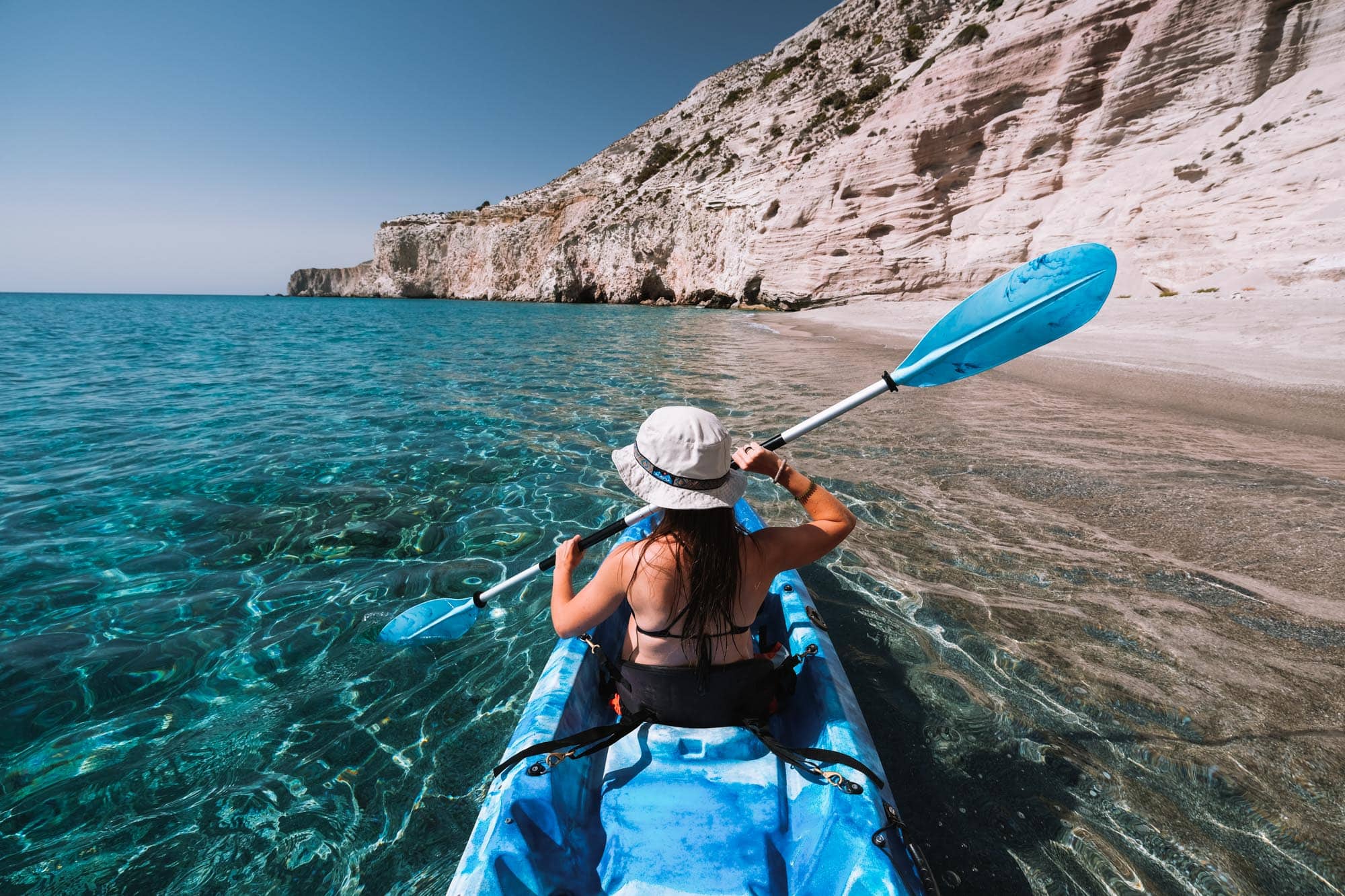 MUST DO: Kayaking along the coast of Milos in Greece